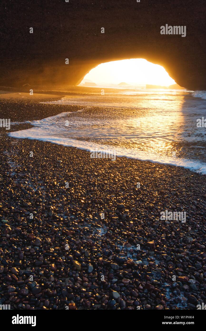 Steep escarpment with bizarre rock formations, Legzira near Sidi Ifni ...
