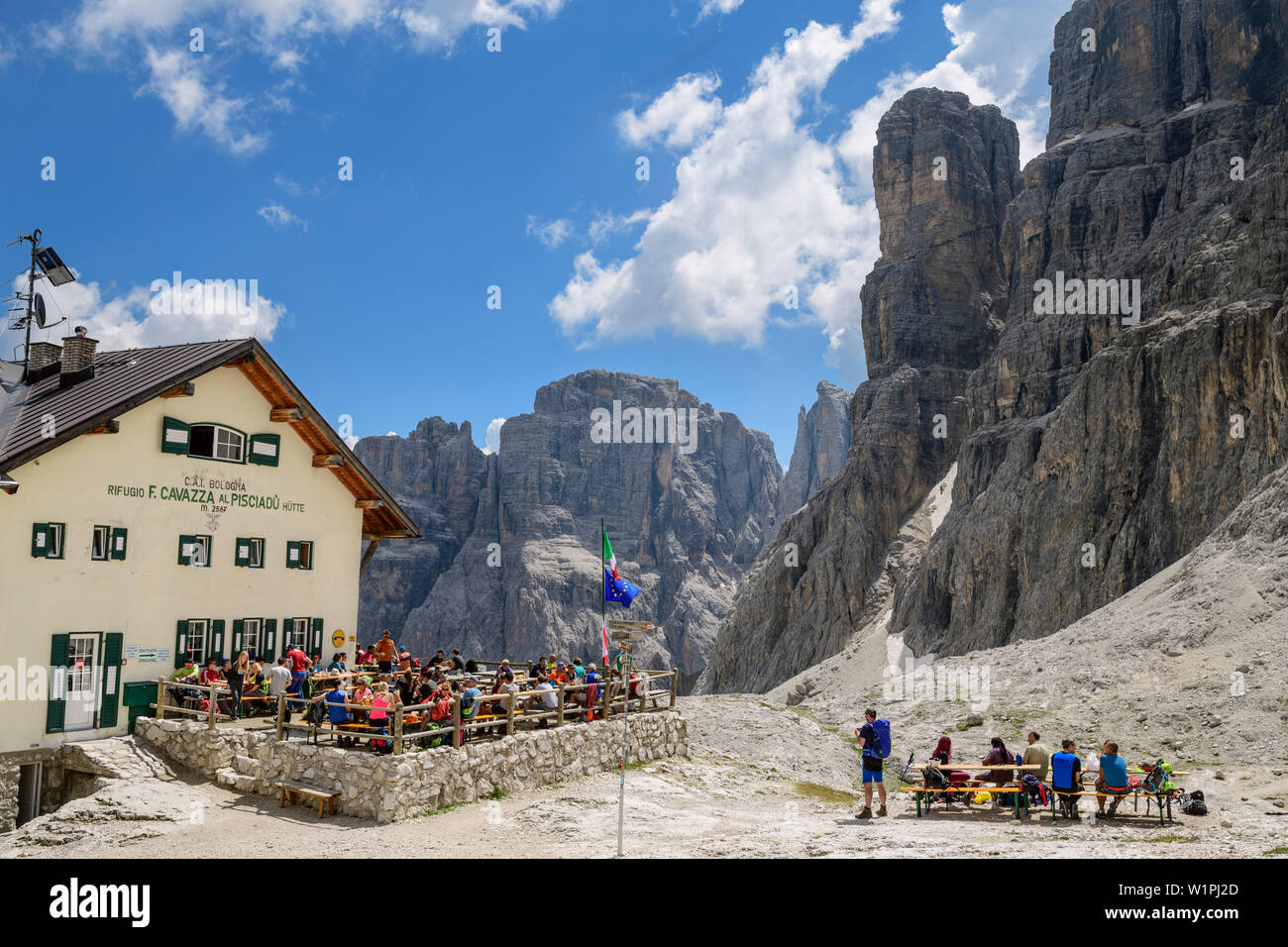 Hut rifugio Pisciadu with rock spires of Sella in background, hut ...