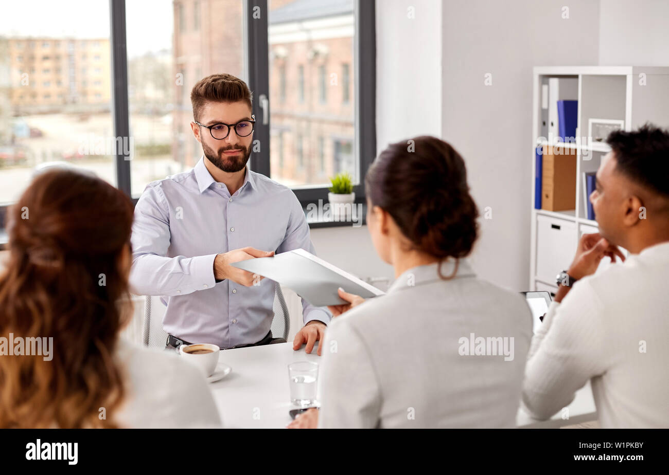 male employee having job interview with recruiters Stock Photo - Alamy