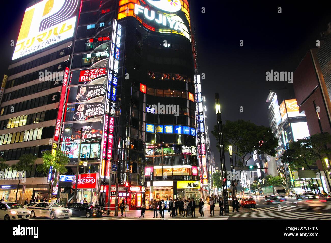 TOKYO, JAPAN - MAY 8, 2012: Shoppers visit Ginza district in Tokyo ...