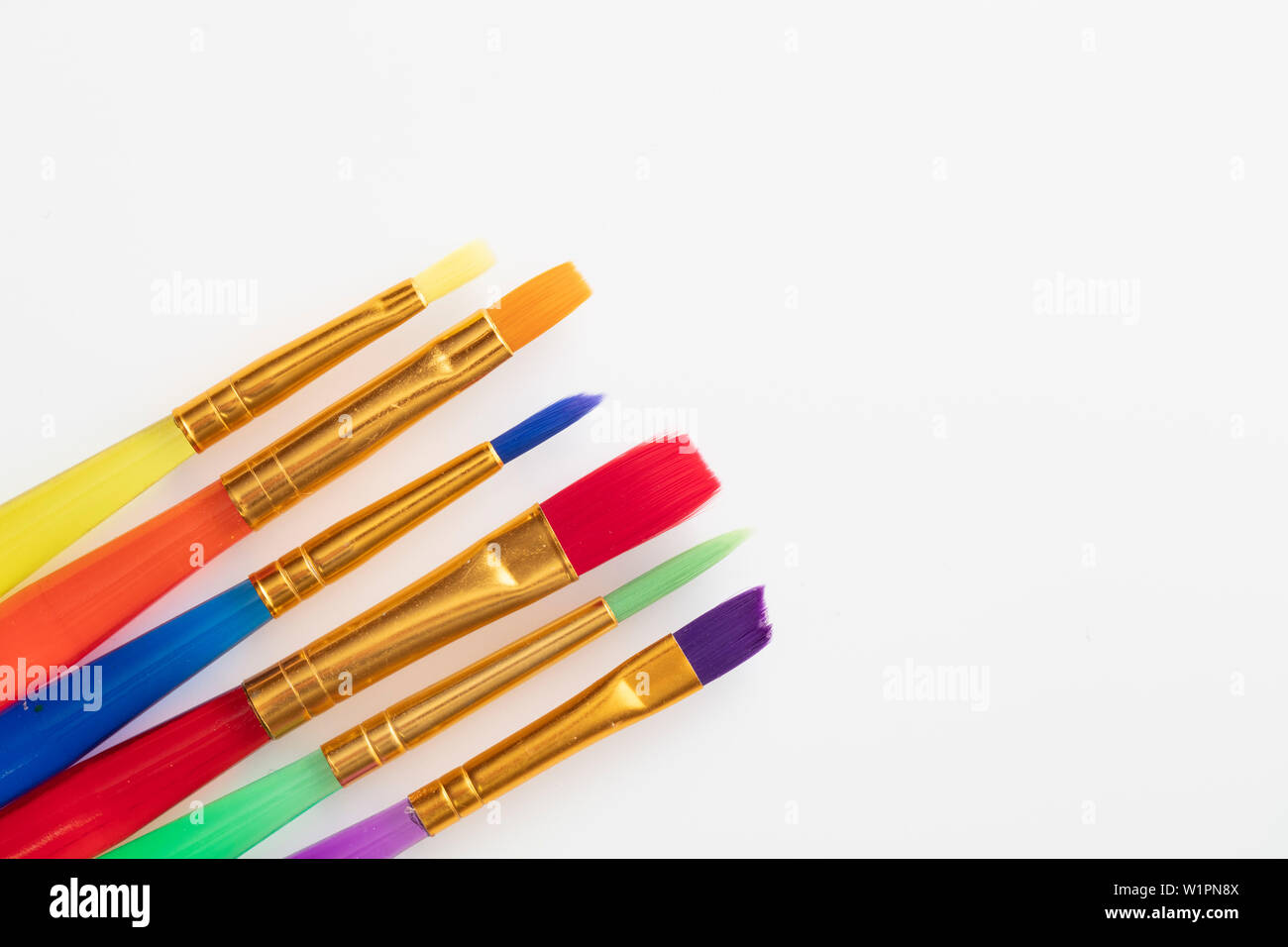 Colourful creative paintbrush art supply background Stock Photo - Alamy
