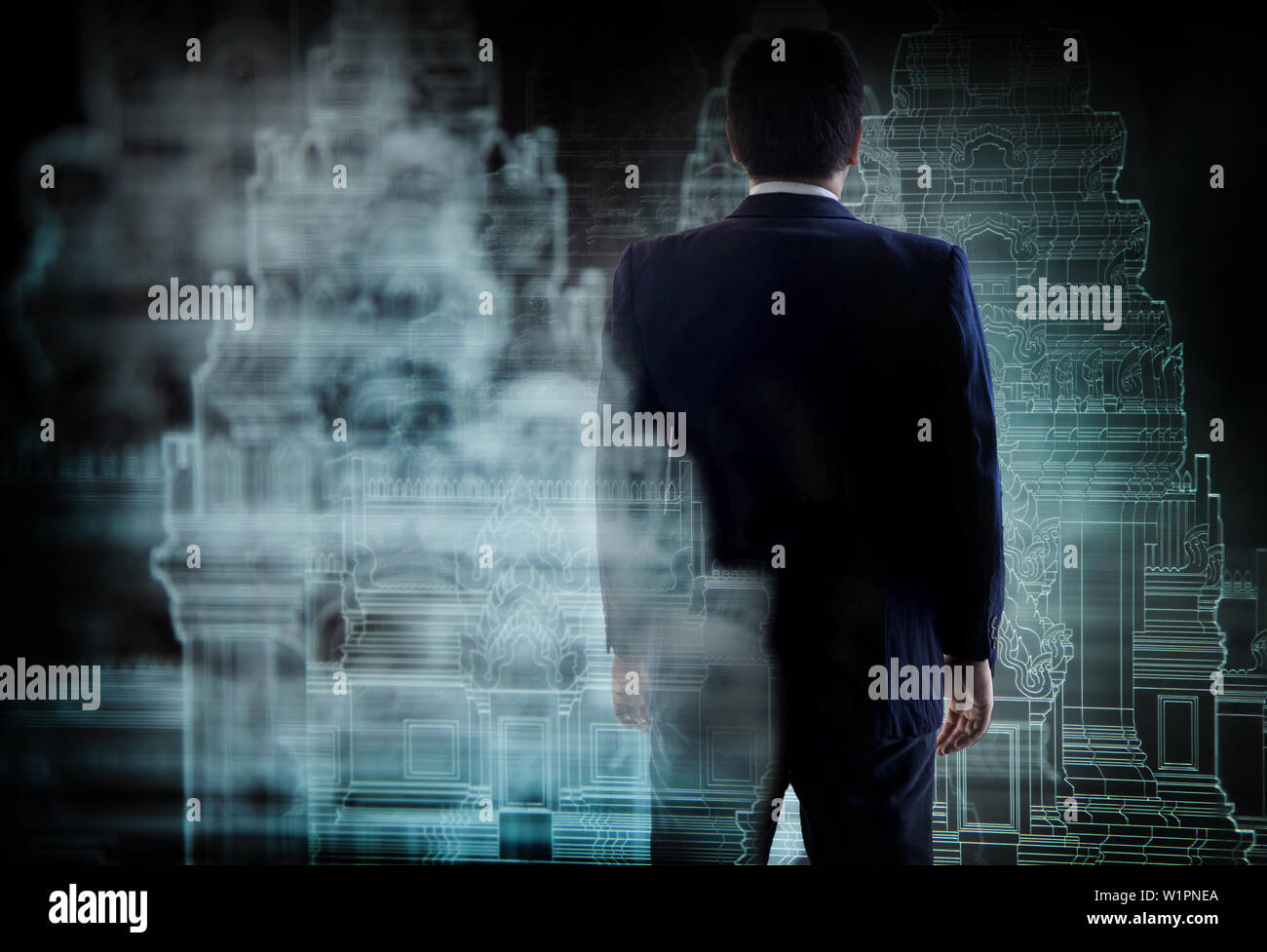 asian business man with architecture design hologram LED line ...