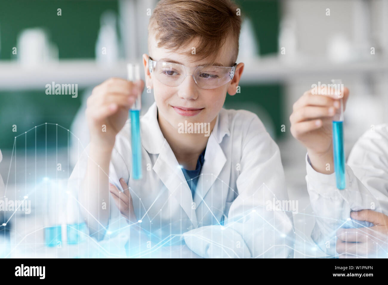 boy with test tube studying chemistry at school Stock Photo - Alamy