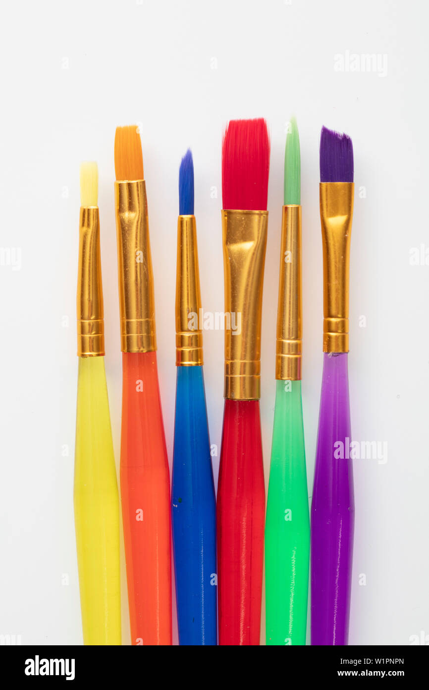 Colourful creative paintbrush art supply background Stock Photo - Alamy