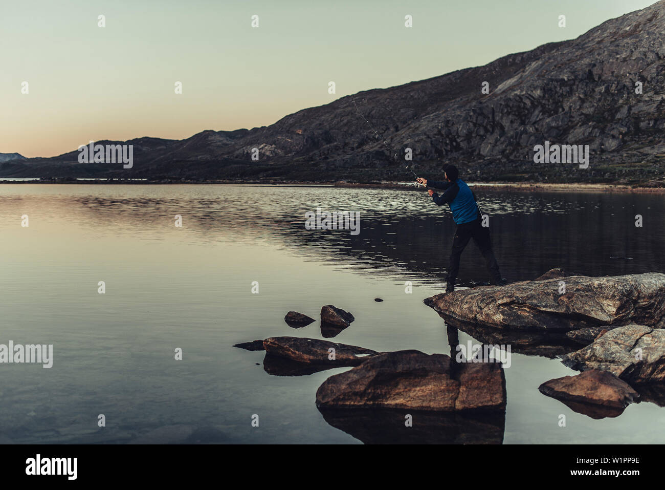 Man fishing in the nature of Greenland, greenland, arctic Stock Photo ...