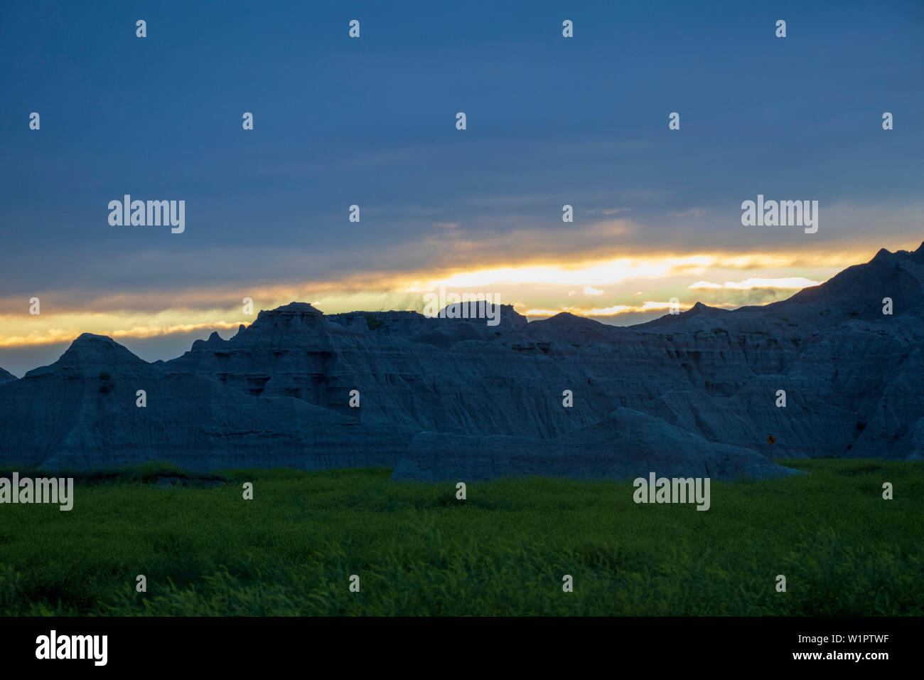 Sunset over desert rock formations Stock Photo - Alamy