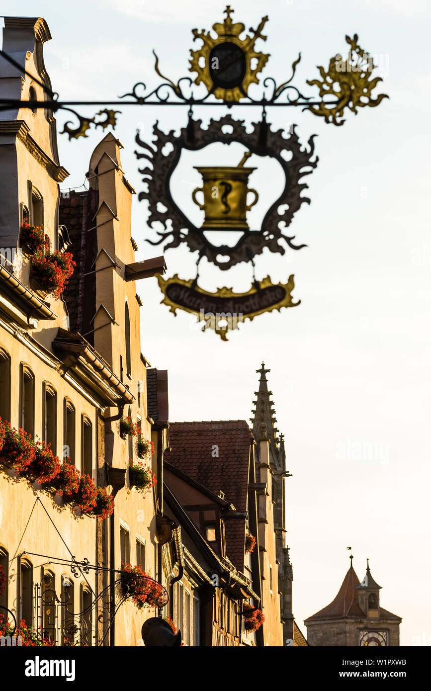 Historical signs in the Herrengasse street, Rothenburg ob der Tauber ...