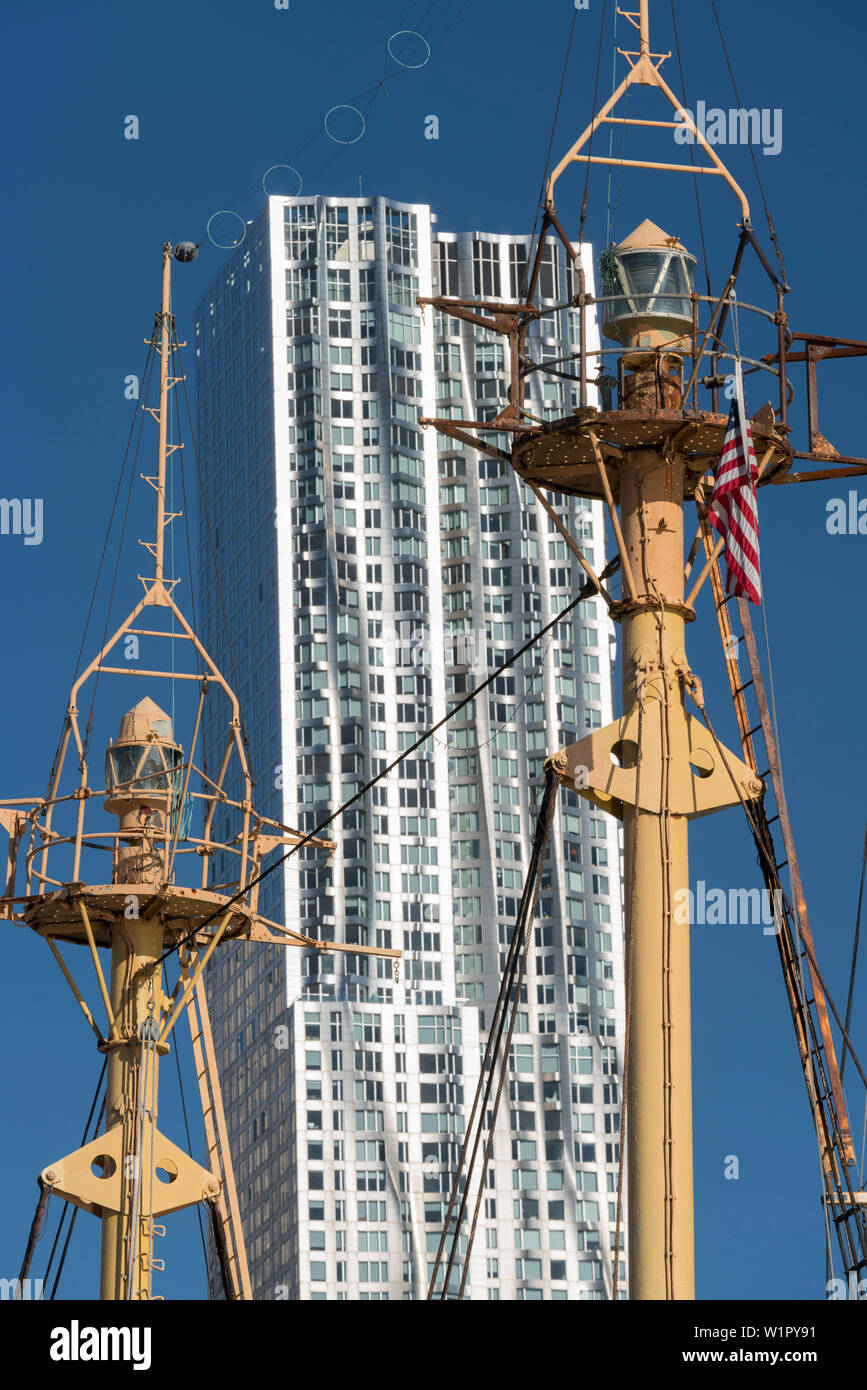 8 Spruce Street skyscraper, ship mast from the South Street Seaport ...