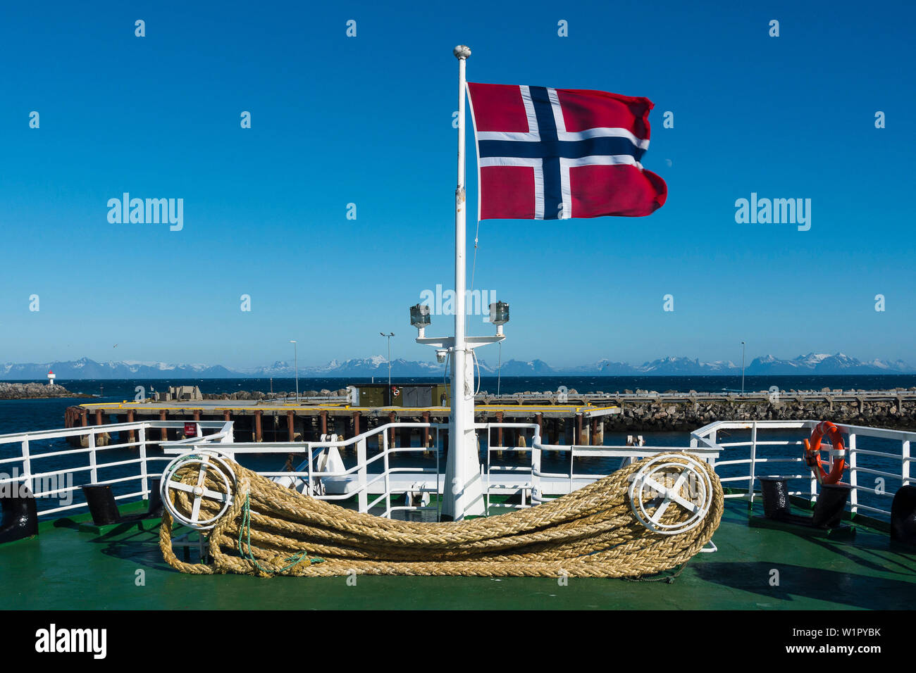 norwegian flag on deck of the ferry from Andenes to Gryllefjord, Senja ...