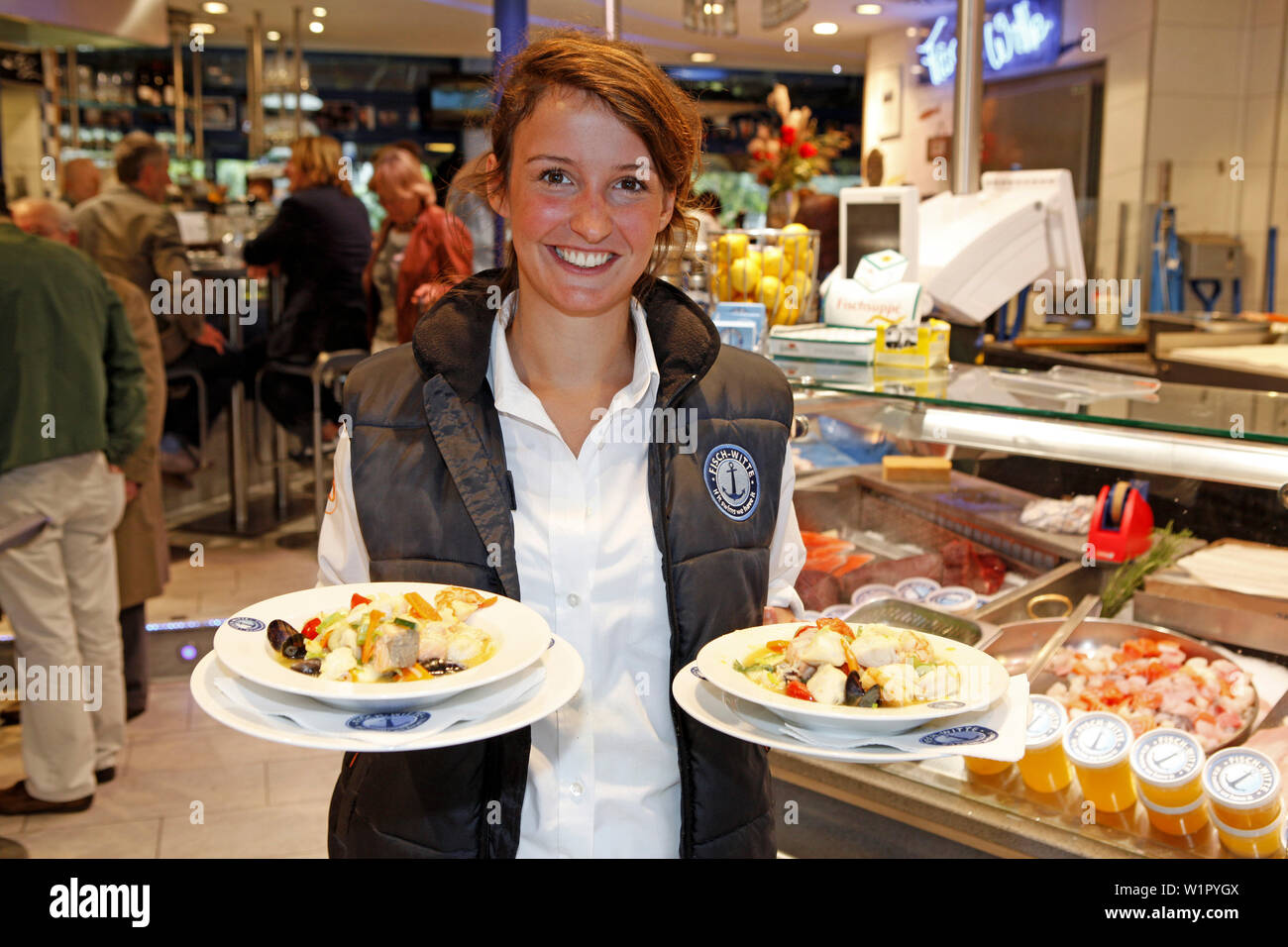 Waitress in the Fisch Witte Bistro, Viktualienmarkt, Munich, Upper ...