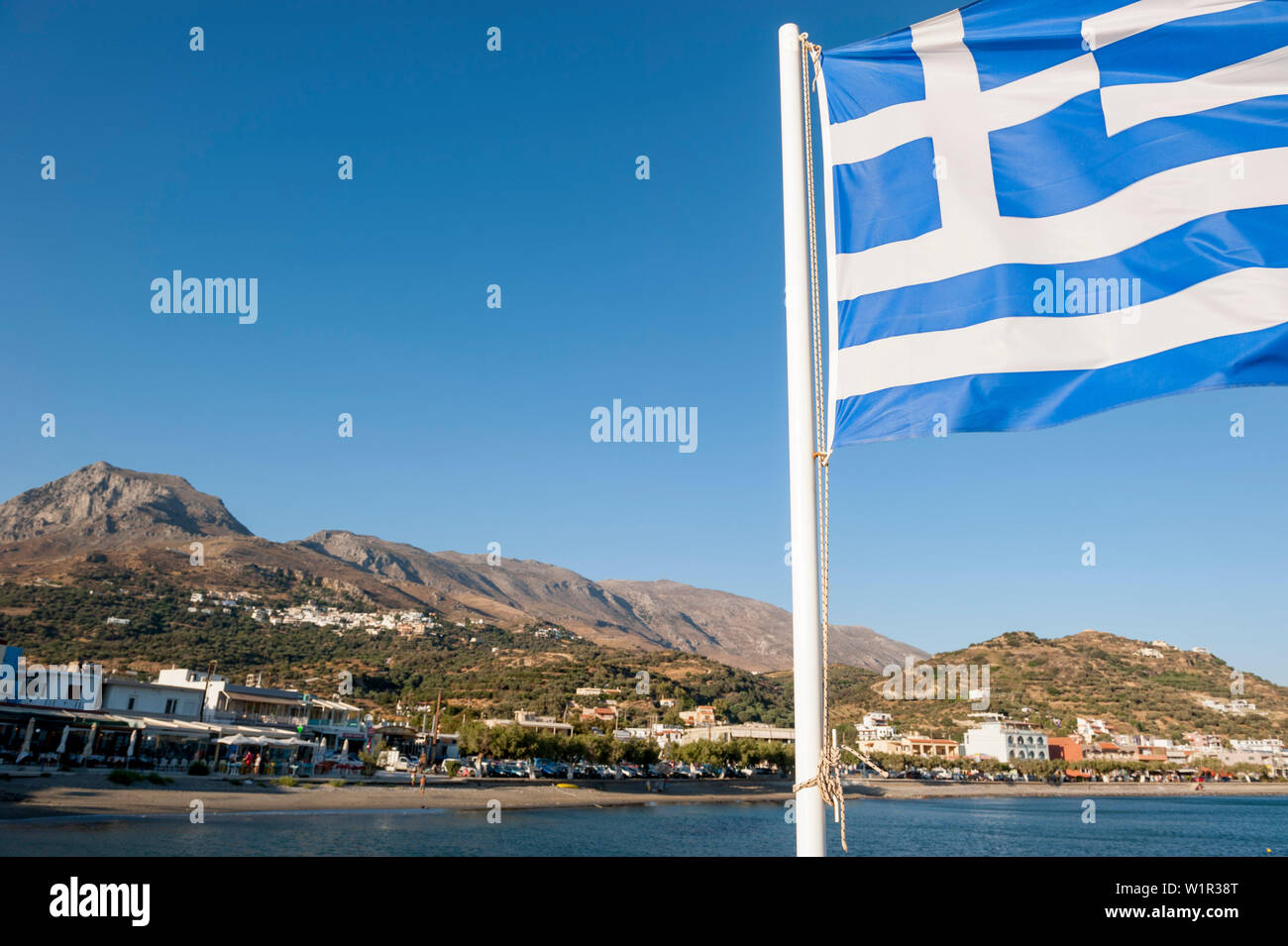 Greek flag at the coast, Plakias, Crete, Greece, Europe Stock Photo - Alamy
