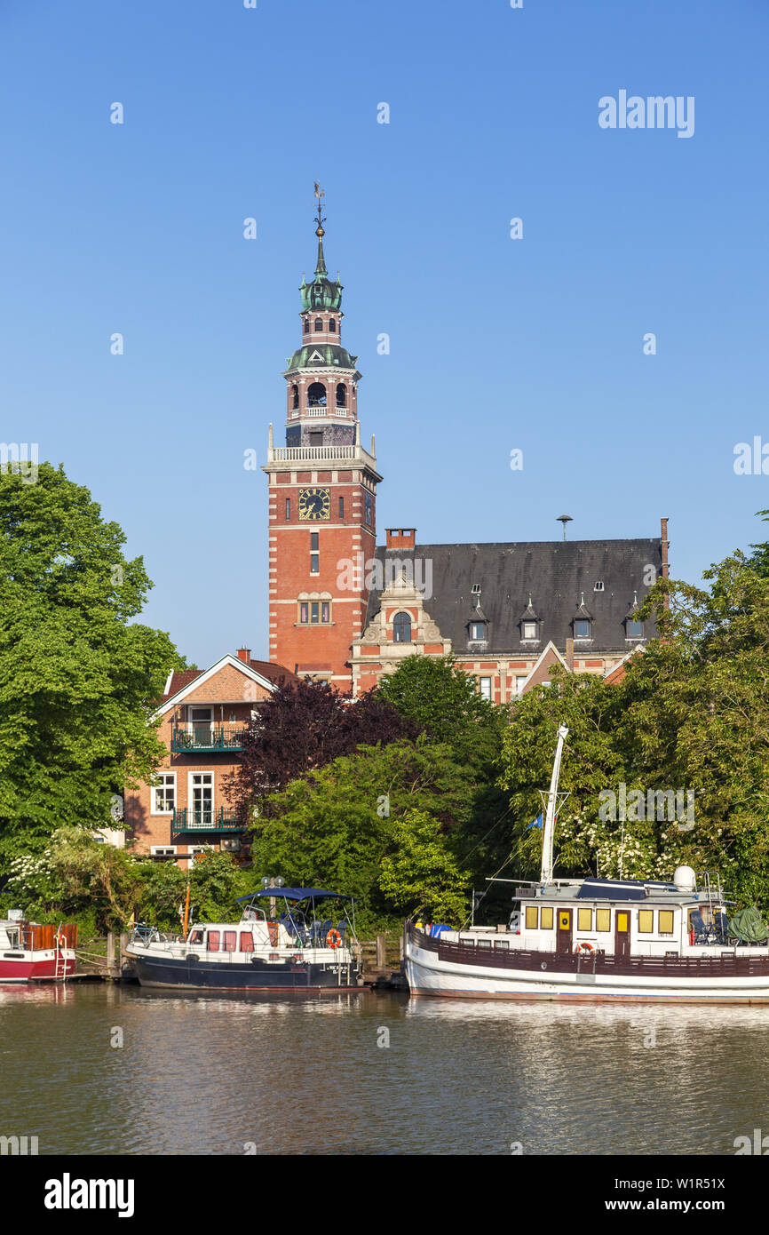Town hall in the historic old town by the harbour of Leer, East Frisia ...