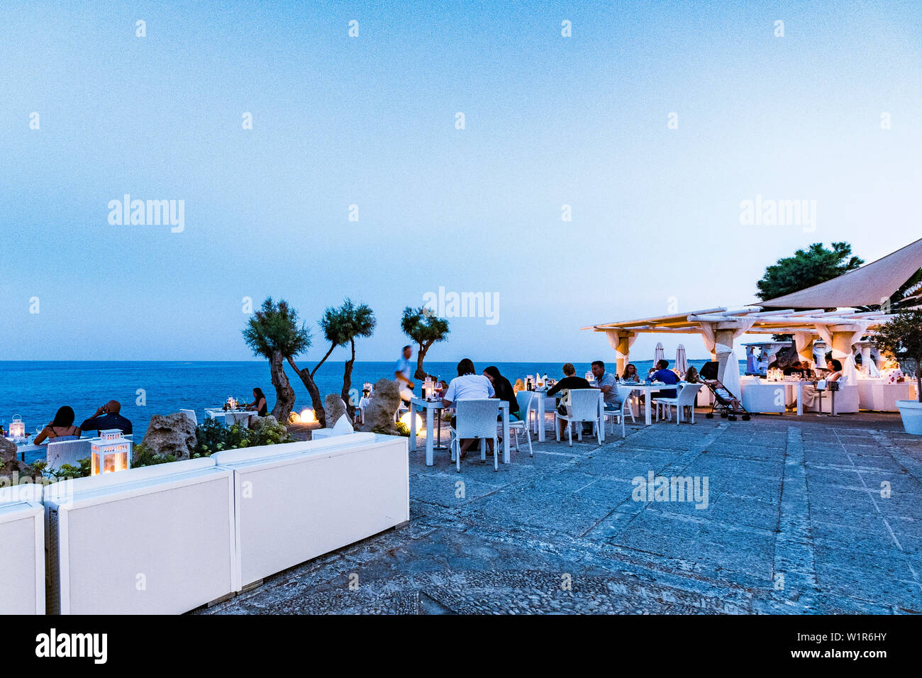 lounge area and dining area near the beach in the Port Verd del Mar in ...