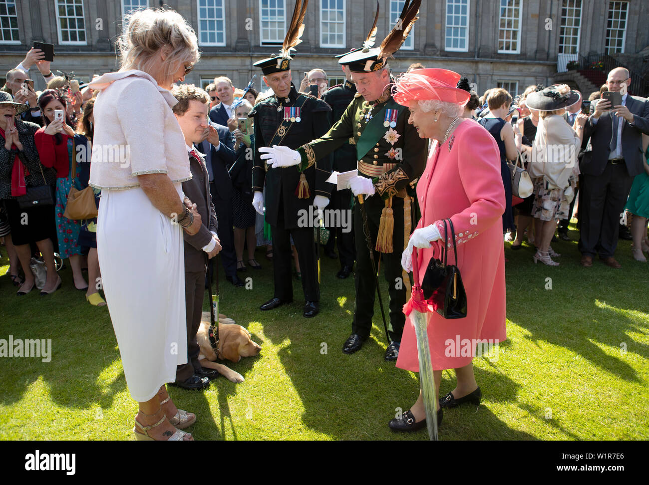 Queen elizabeth ii meets jason byers hi-res stock photography and ...