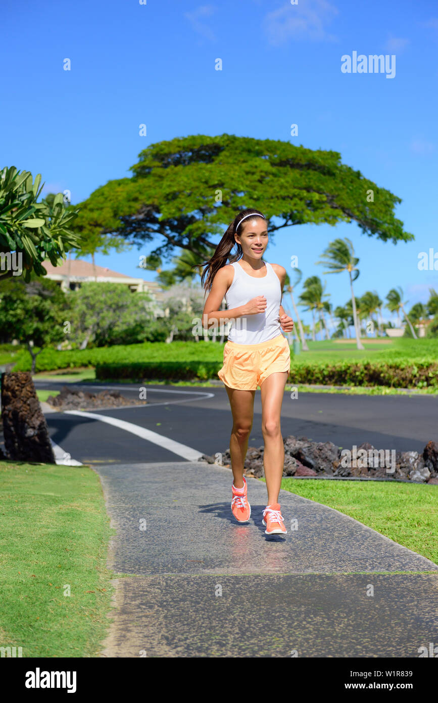 Woman runner jogging city street hi-res stock photography and images ...