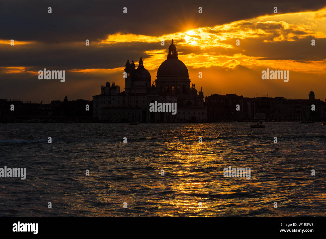 Beautiful sunset over Venice Lagoon and Saint Mary of the Health ...