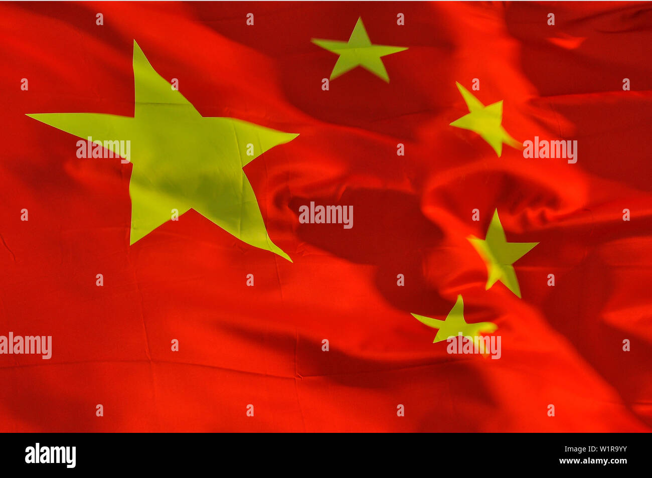 Red flag with yellow stars hi-res stock photography and images - Alamy