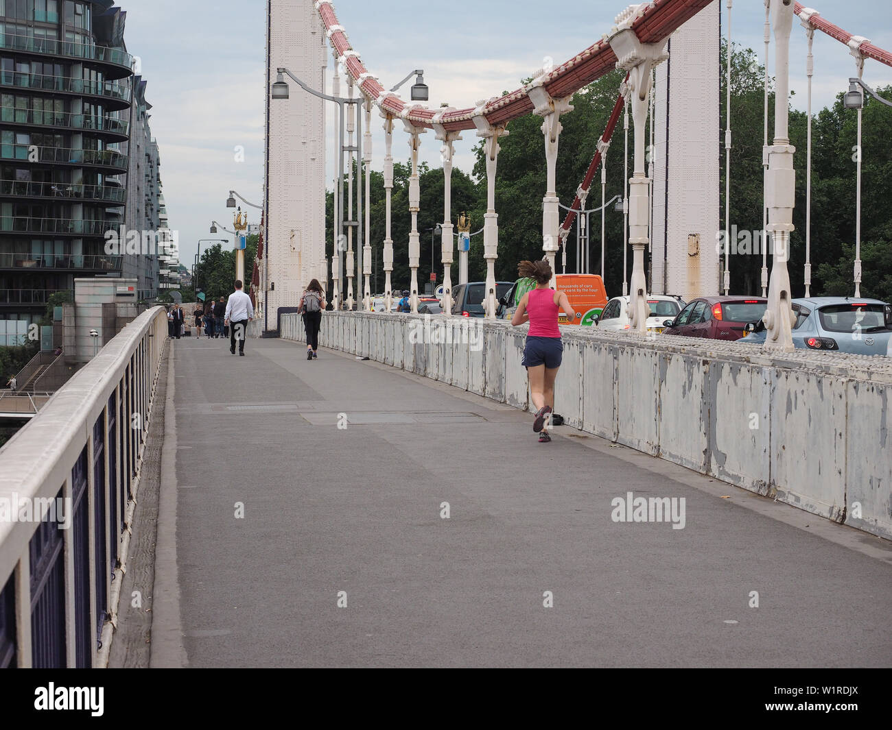 LONDON, UK - CIRCA JUNE 2019: Chelsey Bridge crossing River Thames ...
