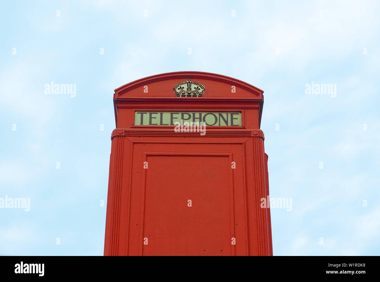 LONDON, UK - CIRCA JUNE 2019: Traditional red telephone box designed by Sir Giles Gilbert Scott ...