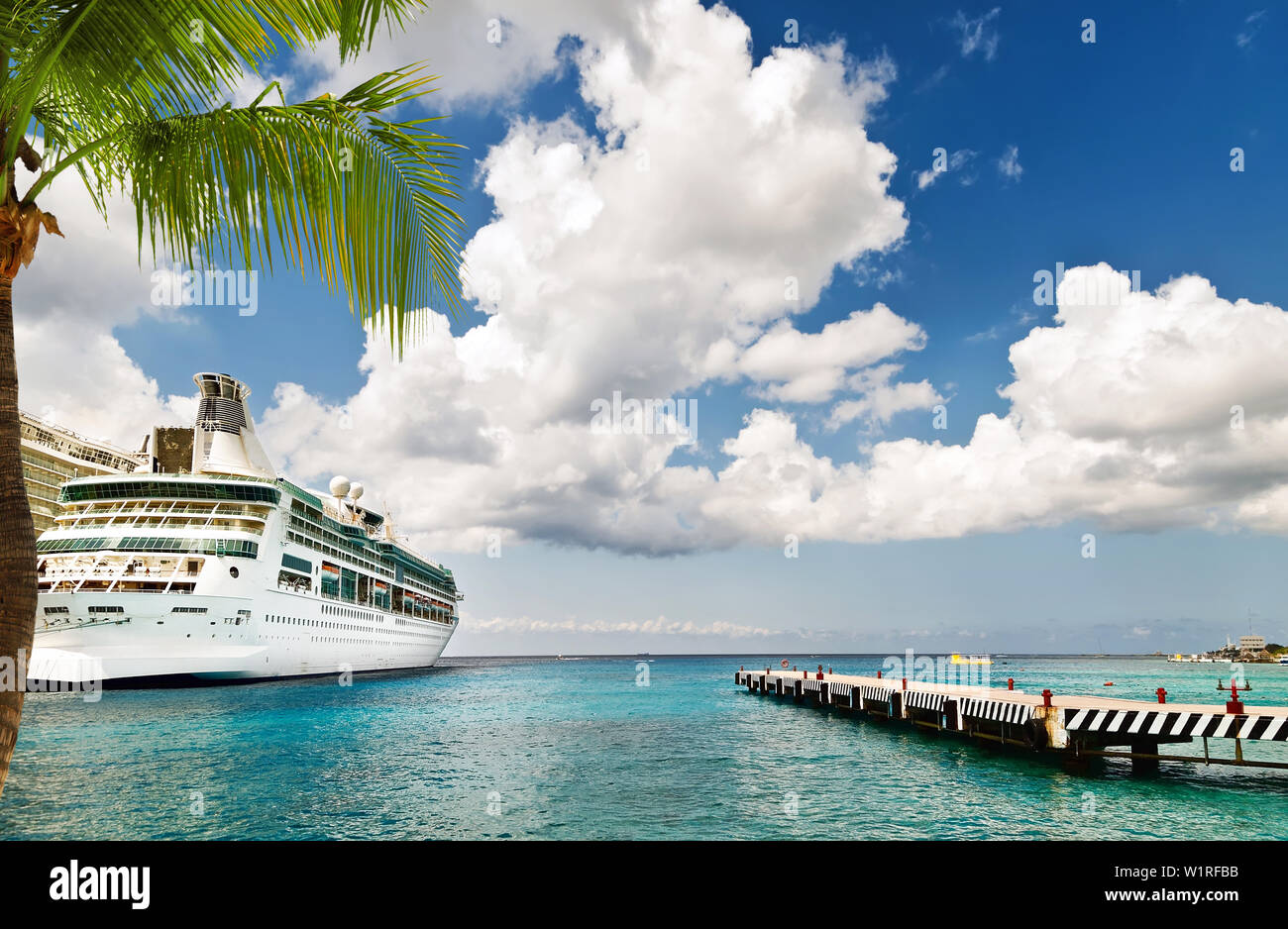 Cruise ship docked at port on sunny day Stock Photo - Alamy