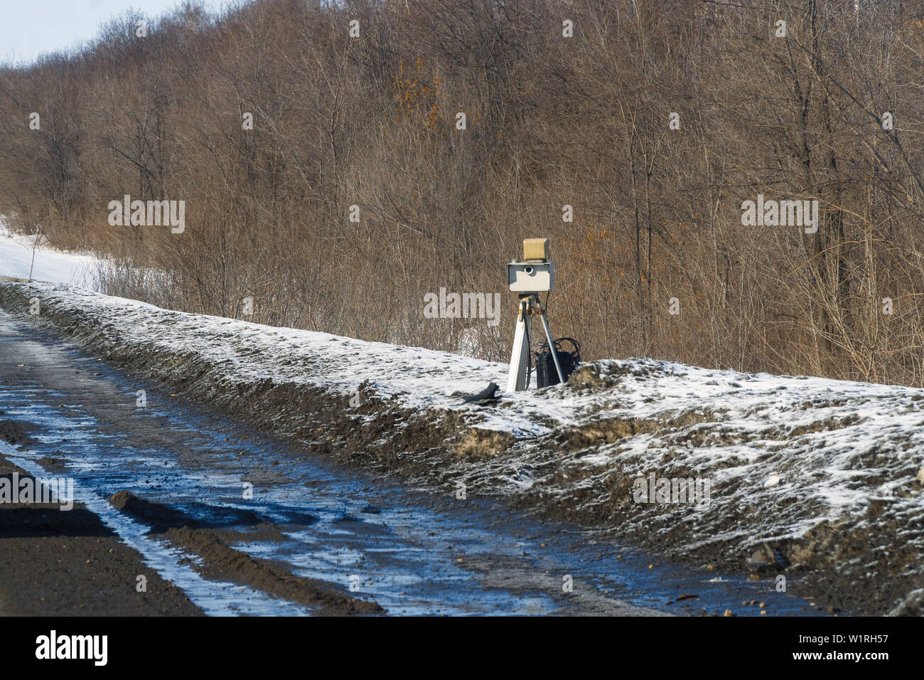 Mobile automatic camera radar on winter road Stock Photo - Alamy