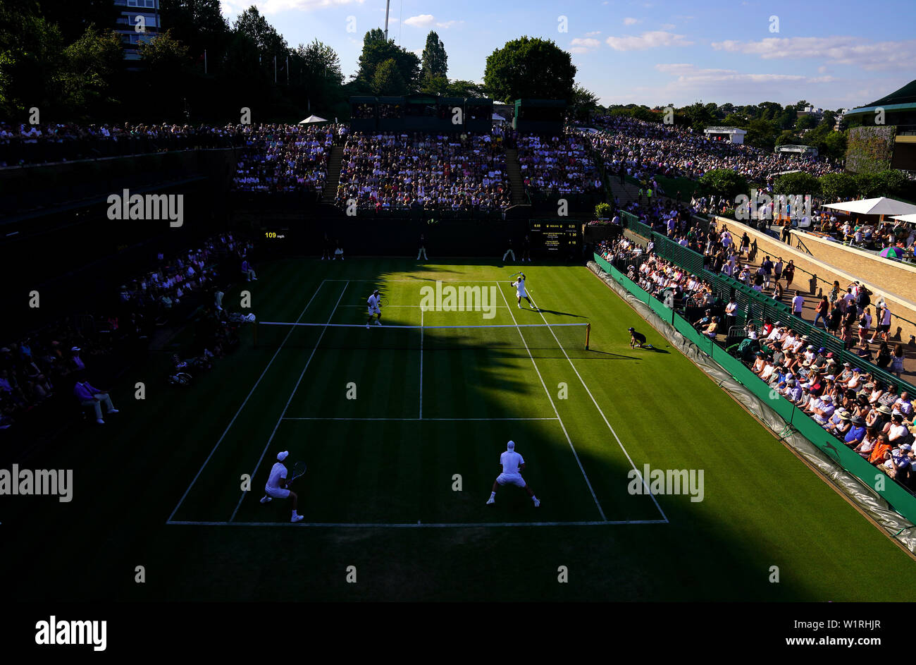 Doubles action on court eighteen on day three of the Wimbledon ...