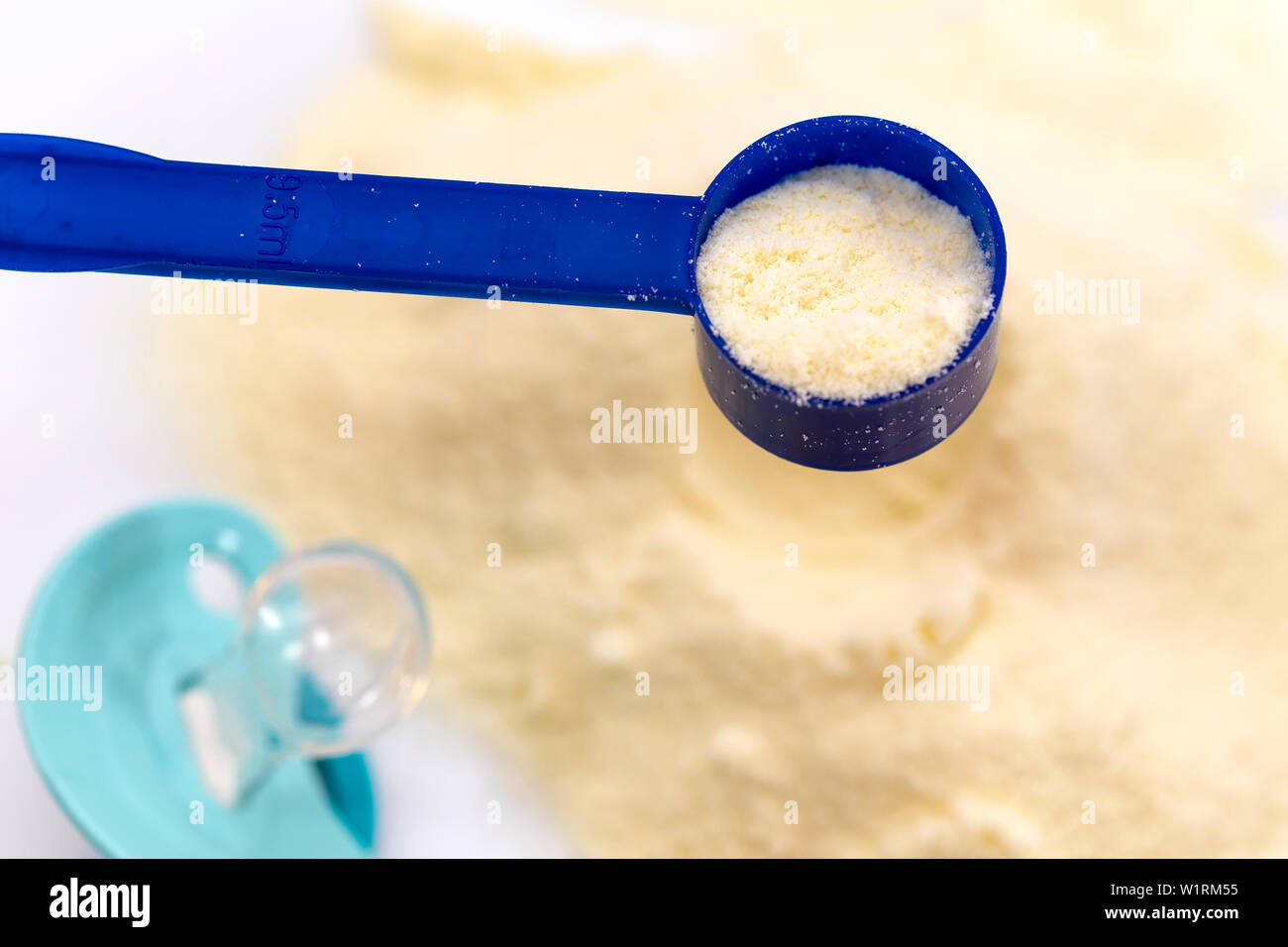 Infant formula in can on white background Stock Photo - Alamy