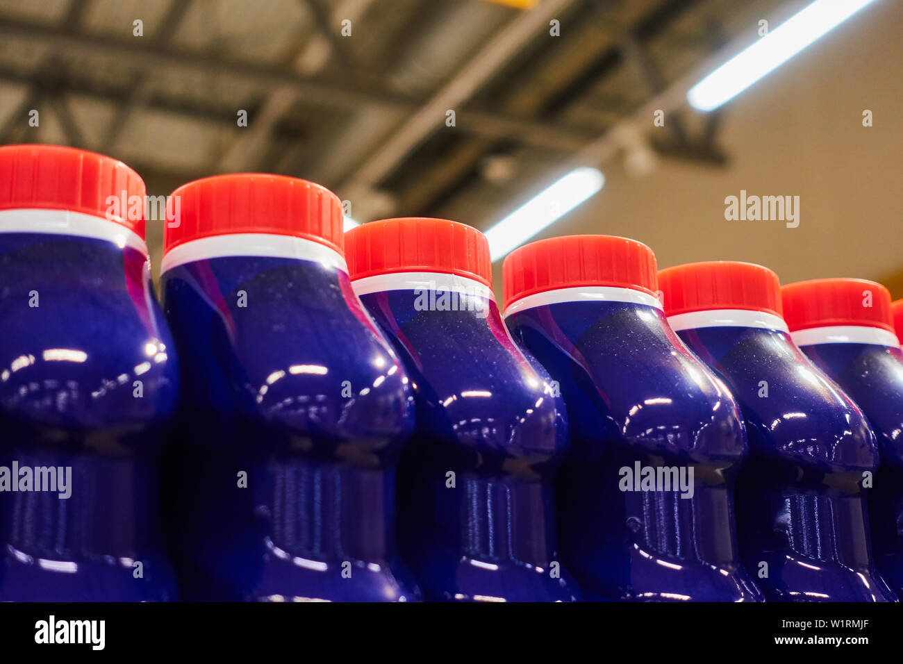 Bottles of plastic with a chemical substance on the store shelf Stock ...