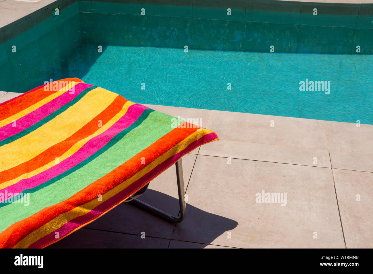 Sun lounger towel pool hi-res stock photography and images - Alamy