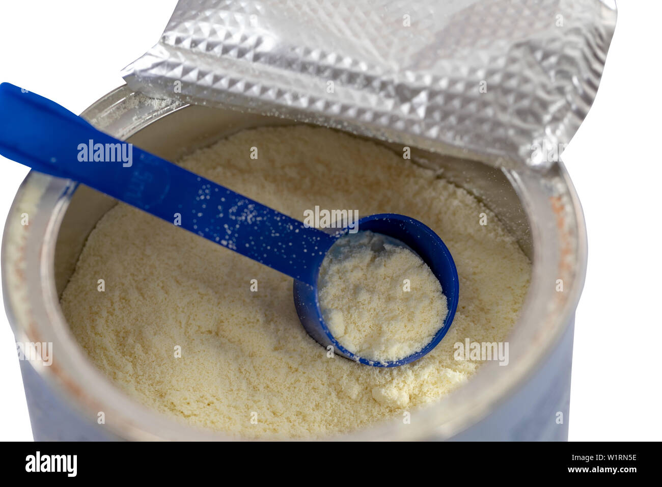 Powder milk food for baby and blue spoon on white background Stock ...