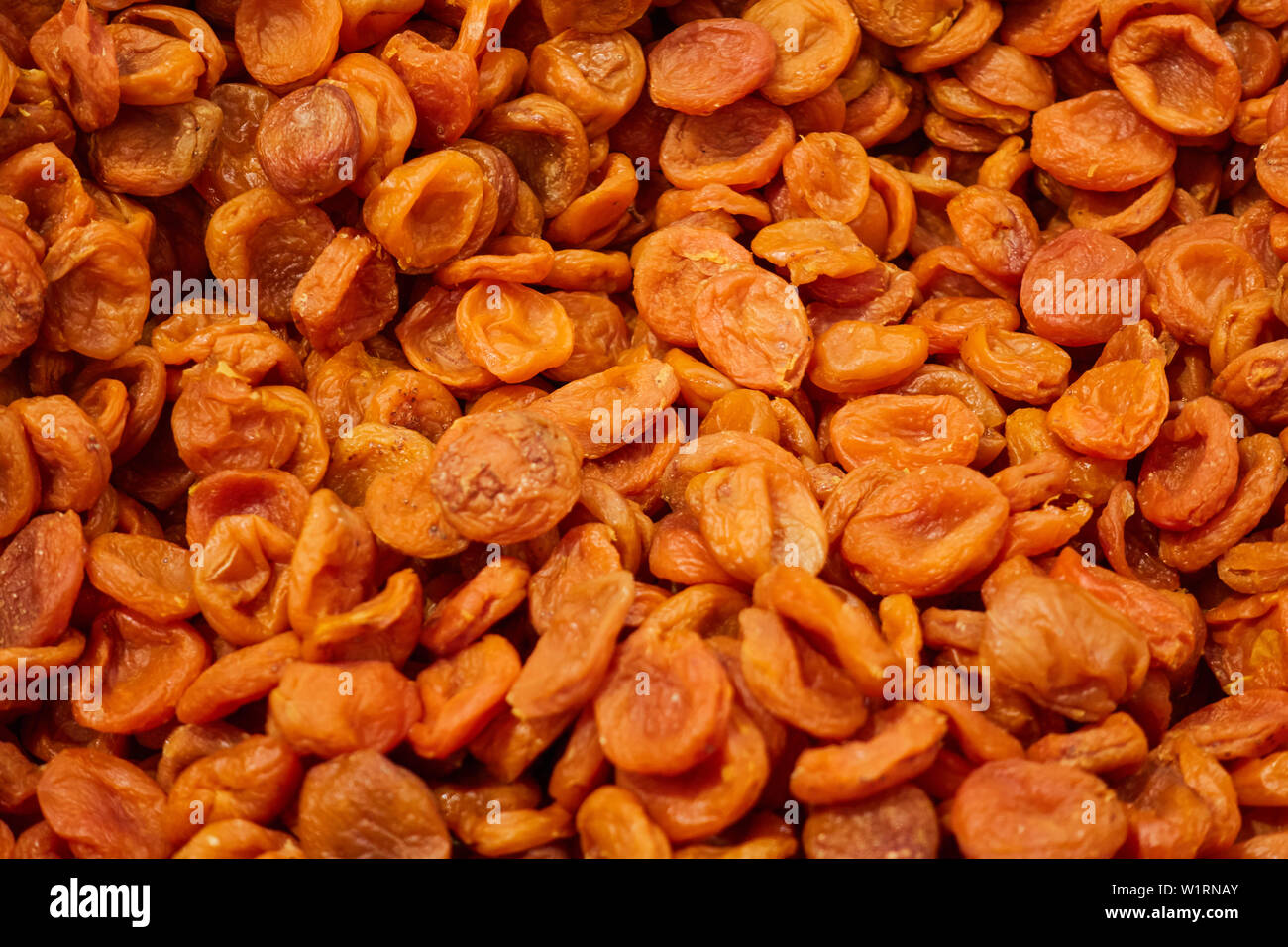 Dried apricots are on the counter of the store Stock Photo - Alamy