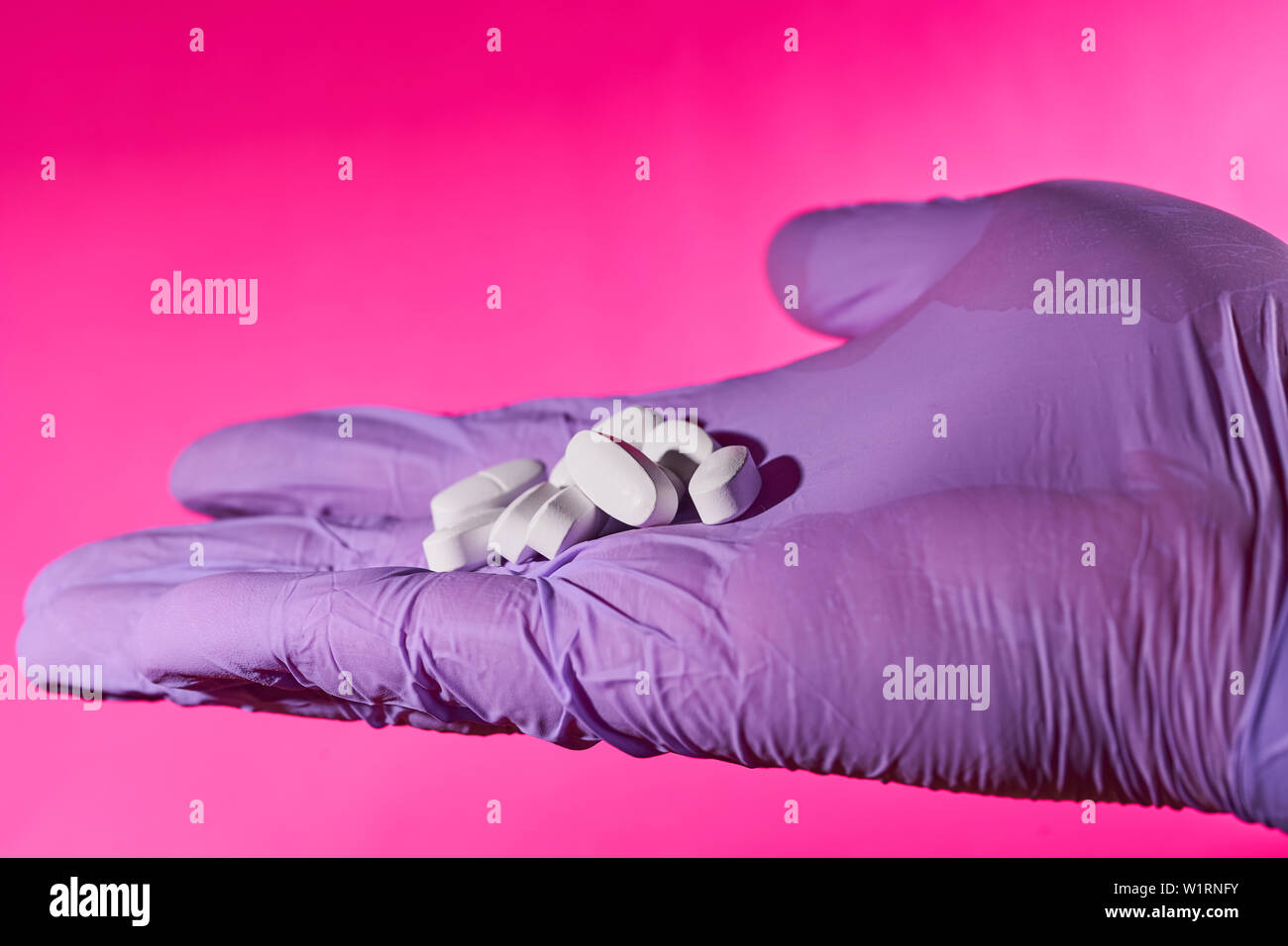 Doctor holding medicines in hi-res stock photography and images - Alamy