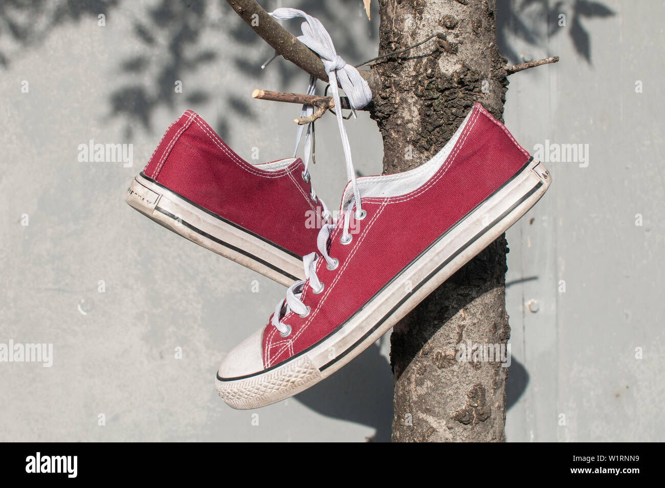 Worn out tennis shoes hi-res stock photography and images - Alamy