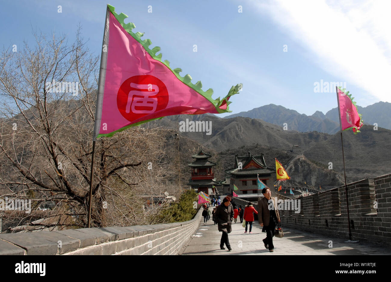 Great Wall of China at Juyongguan Beijing. Visitors walk on a steep ...