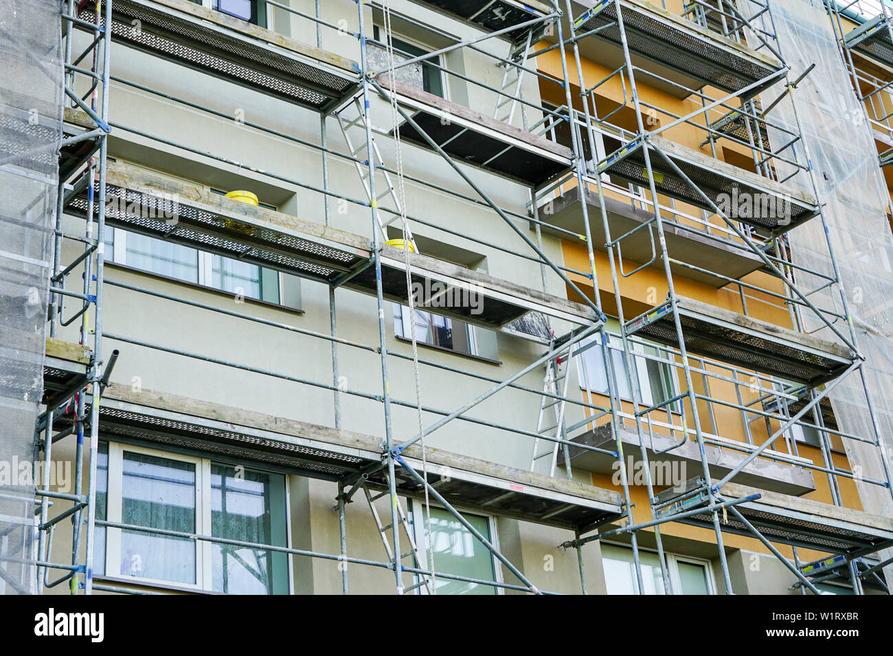 scaffolding before installation of the thermal insulation of the house ...
