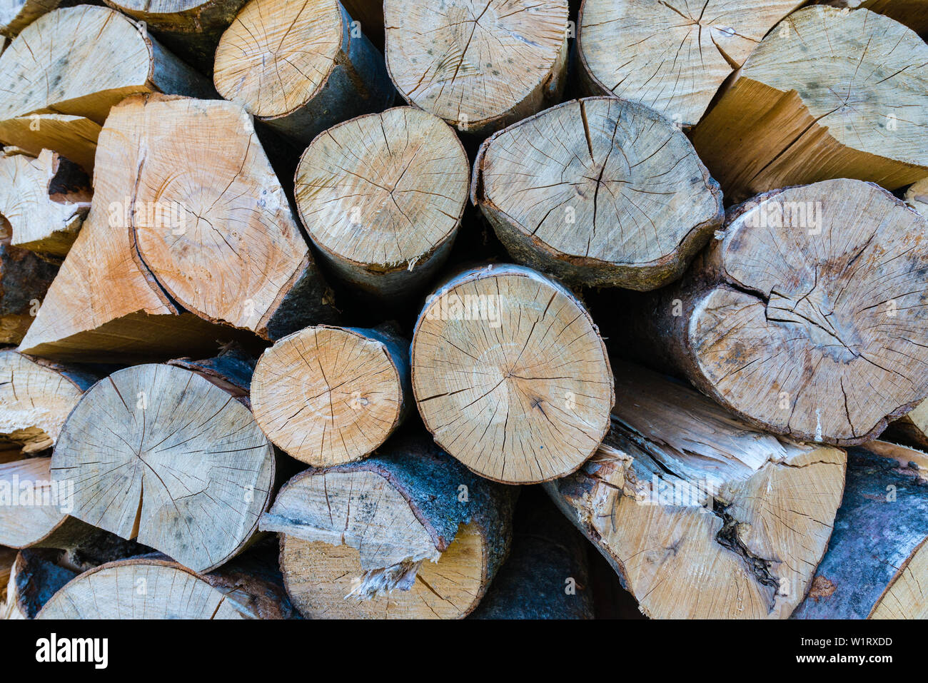 Wall of stacked wood logs as background - high resolution image Stock ...