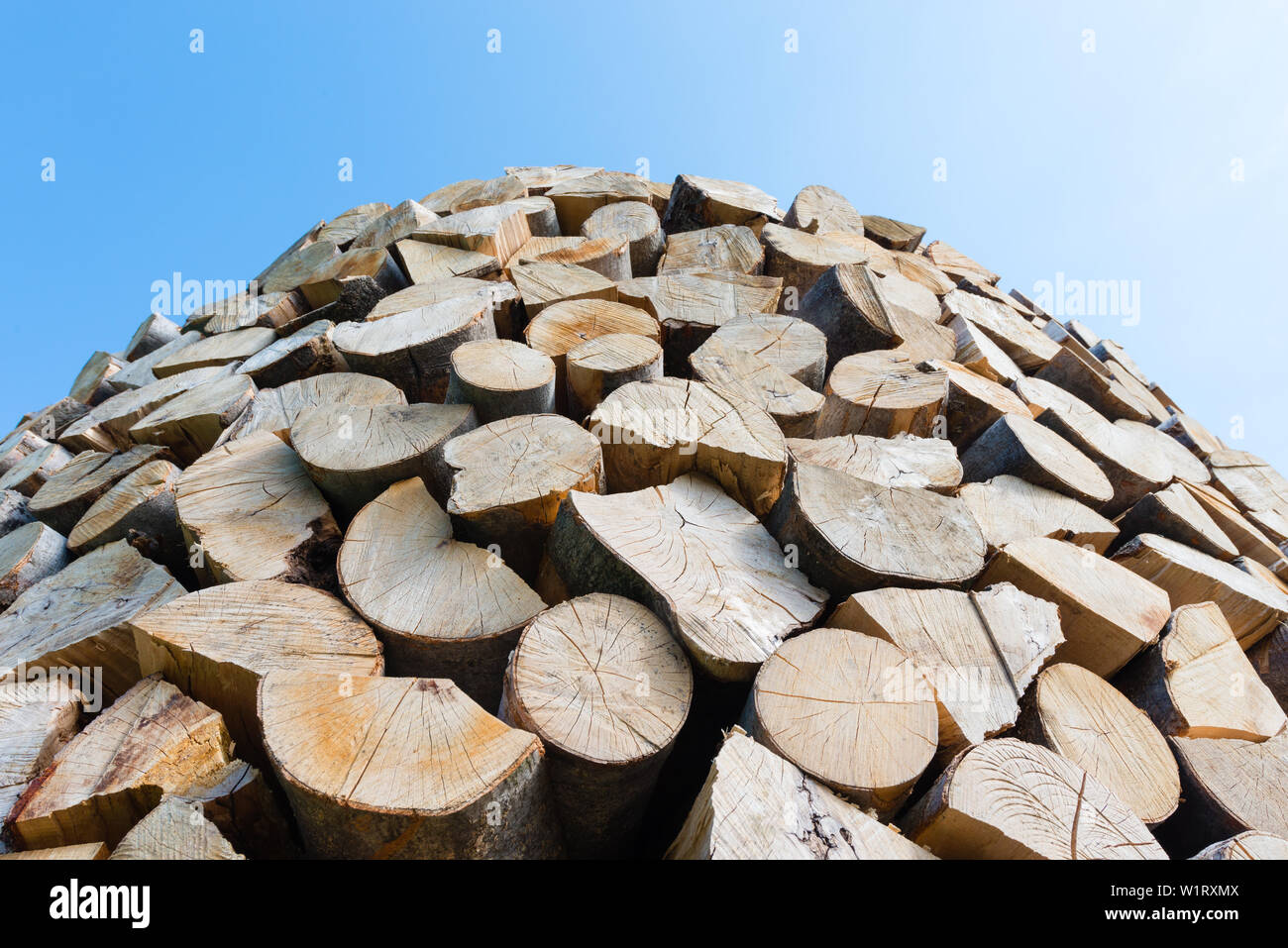 Wall of stacked wood logs as background - high resolution image Stock ...