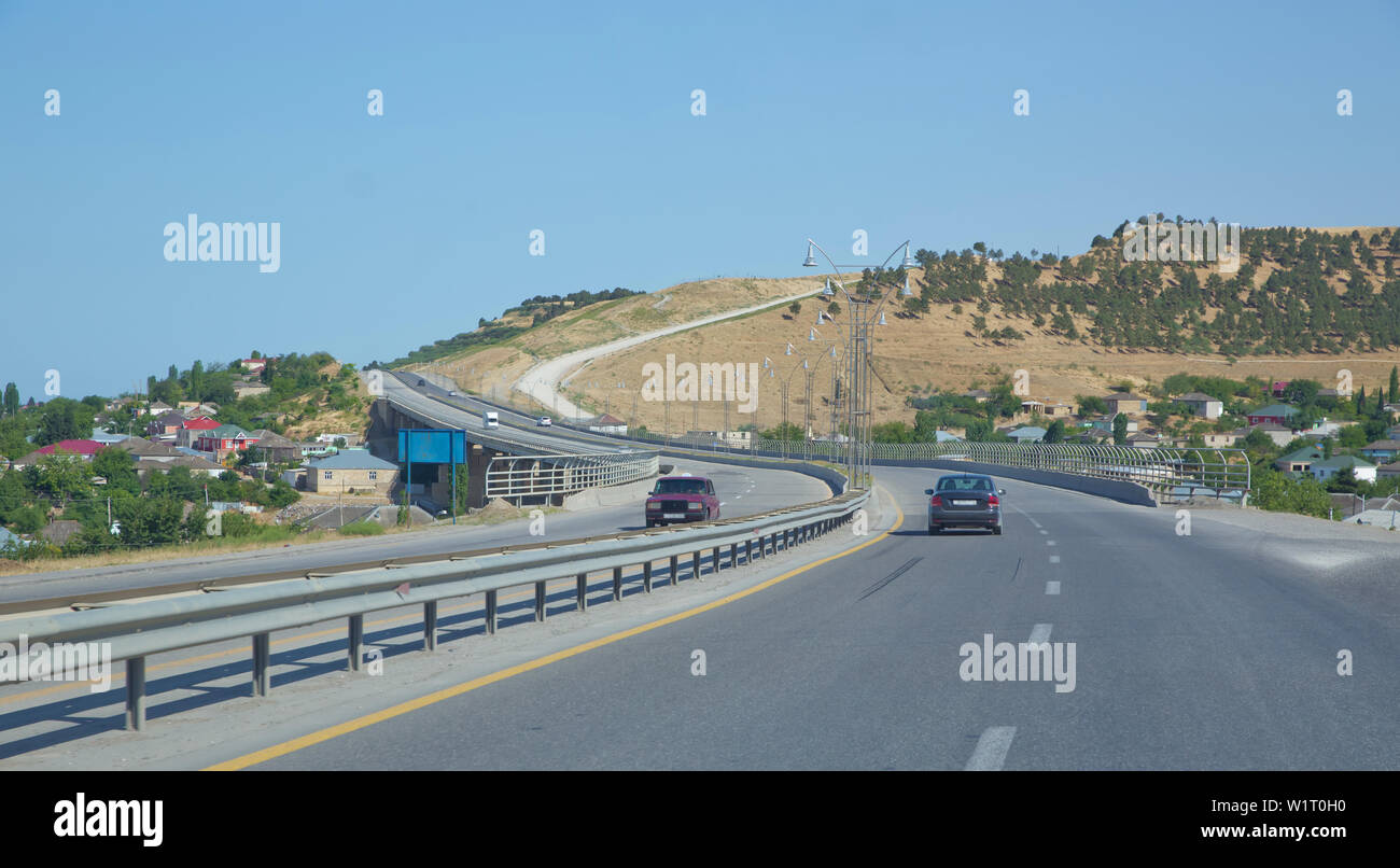 The path to the car. yellow mountains. Road trip, fun car ride on ...