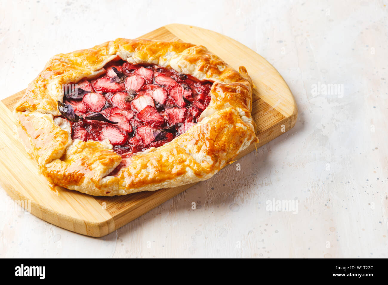 Homemade strawberry open pie gallet with purple basil and balsamic ...