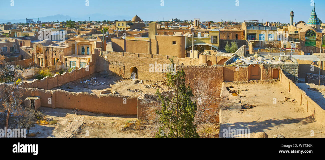 Watch the panorama of old town with adobe buildings, shabby mud fences ...