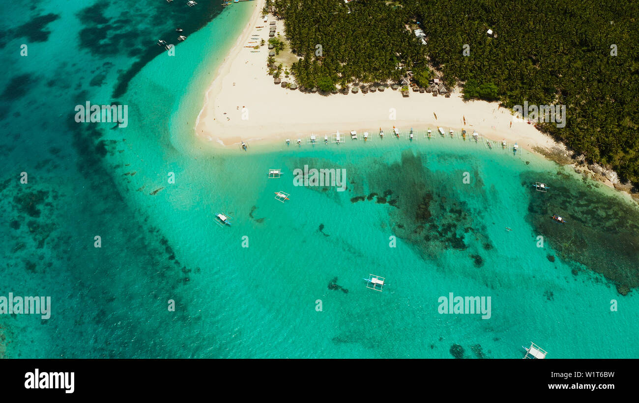 Tropical landscape: Daco island with beautiful beach, palm trees by ...