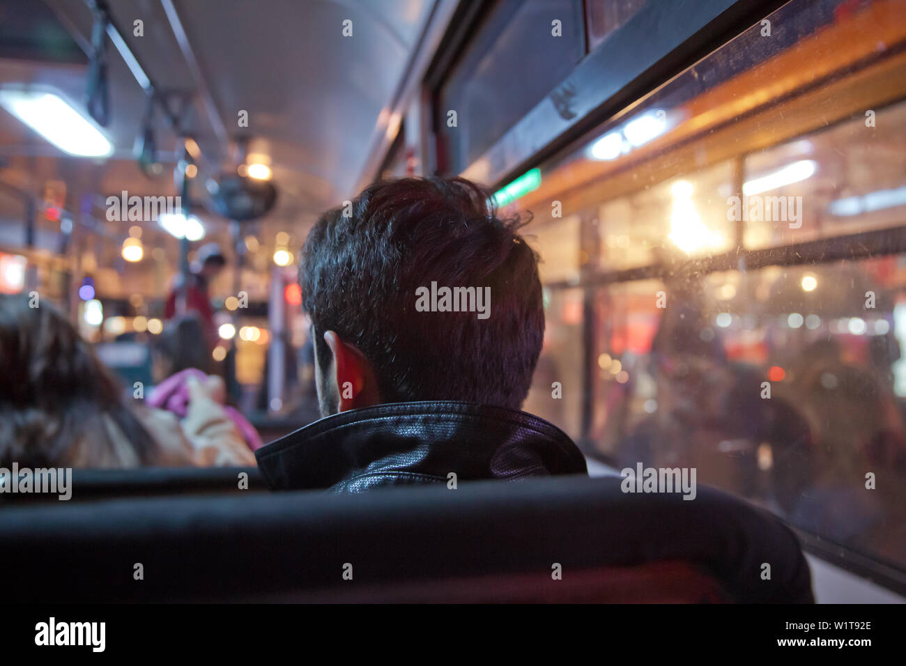 People sitting on a comfortable bus in Selective focus and blurred ...