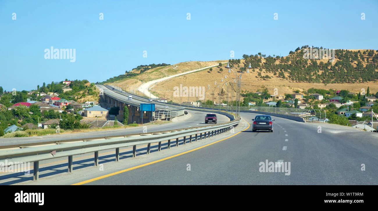 The path to the car. yellow mountains. Road trip, fun car ride on ...