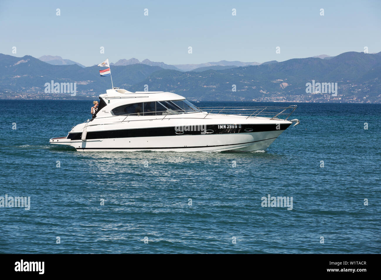 Luxury speed boat on Garda Lake. Italy Stock Photo - Alamy