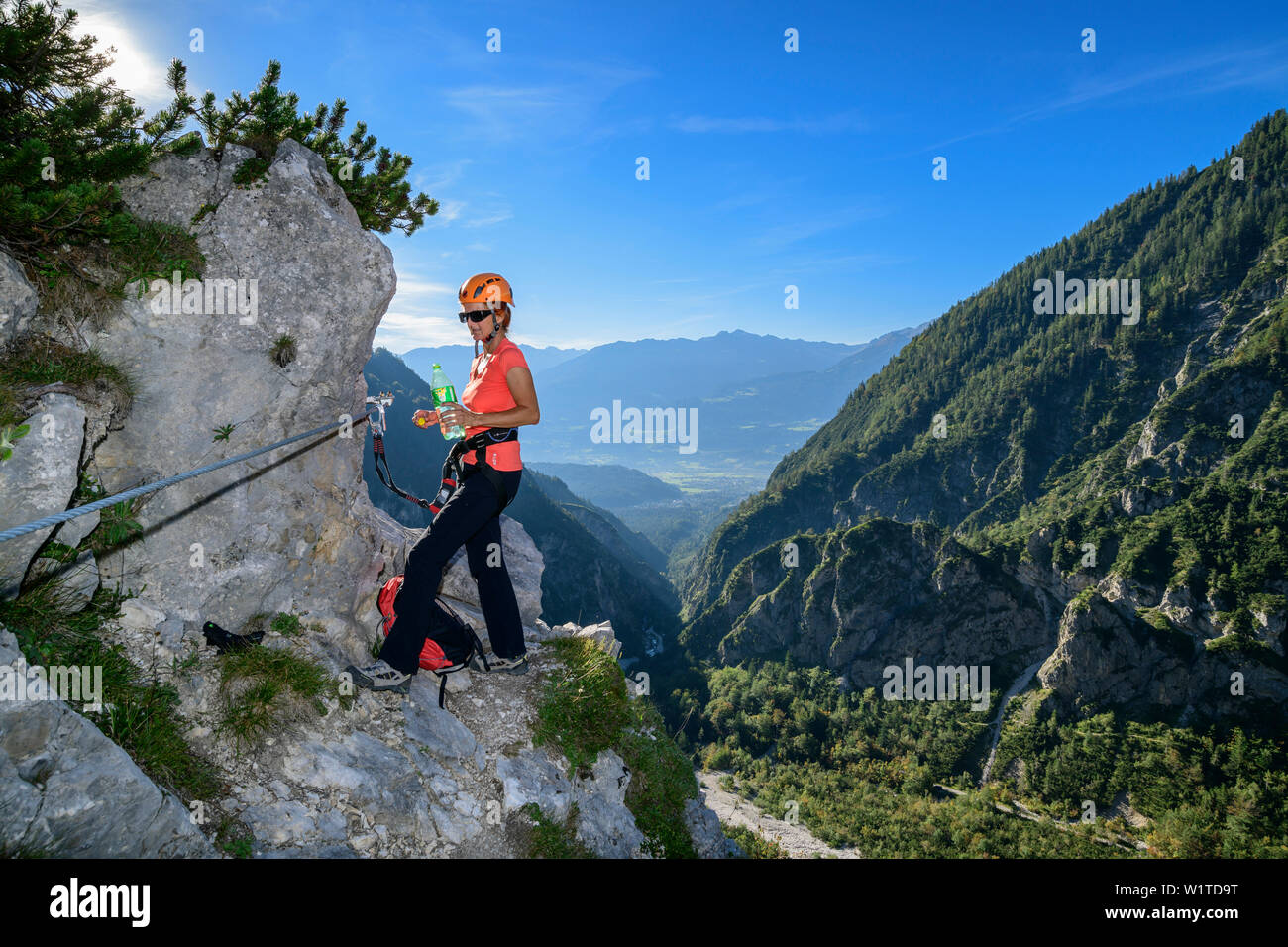 The woman makes on a via ferrata Bettelwurf Pause, Absamer via ferrata ...
