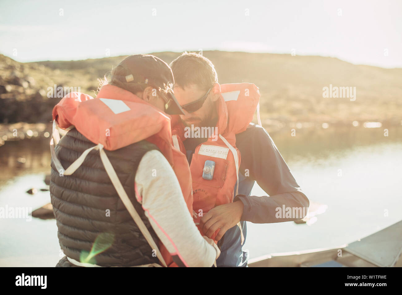 Hikers put on life jackets , greenland, arctic Stock Photo - Alamy