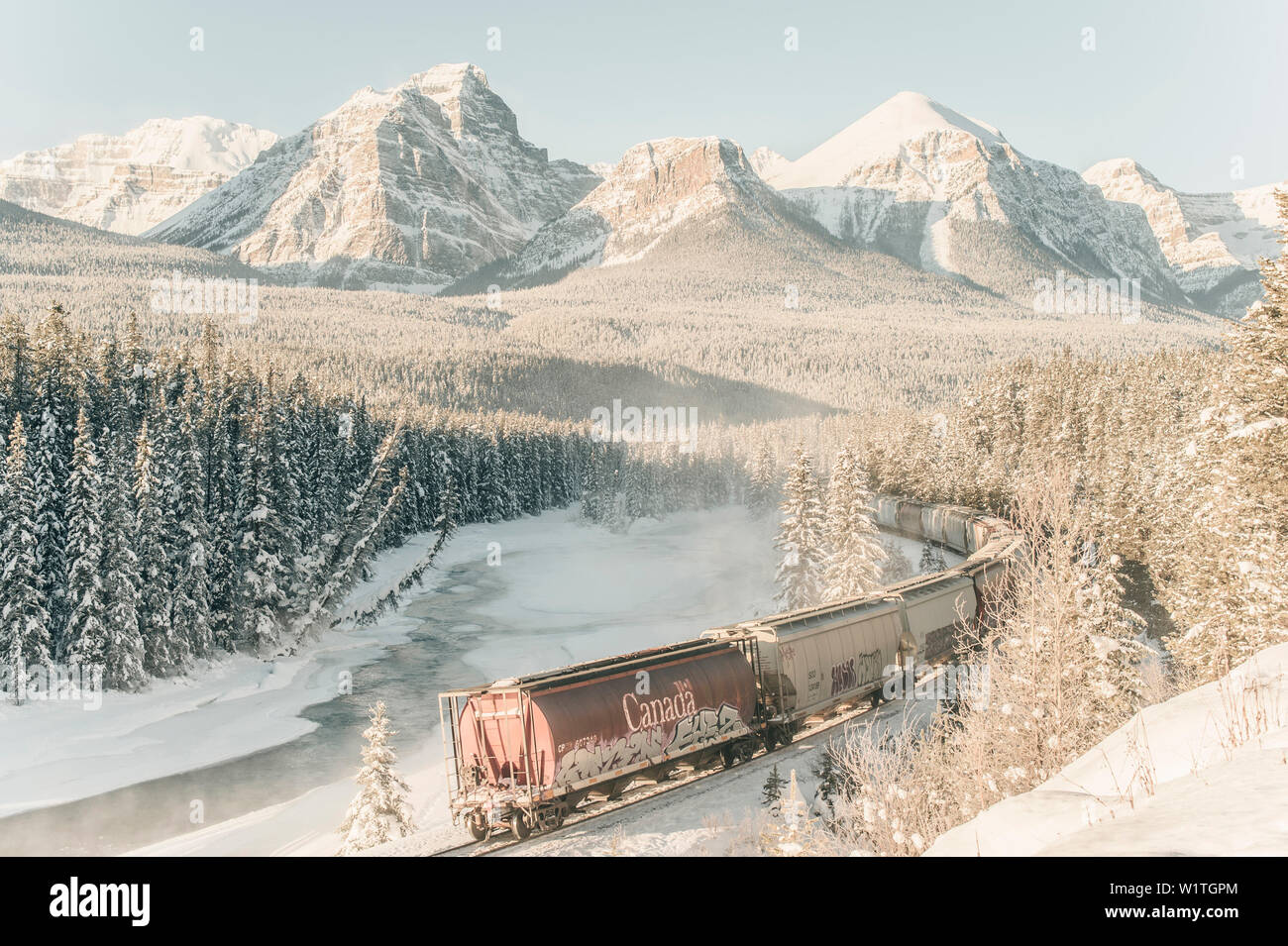 Train passing Morant´s Curve, Banff Town, Bow Valley, Banff National Park, Alberta, canada ...