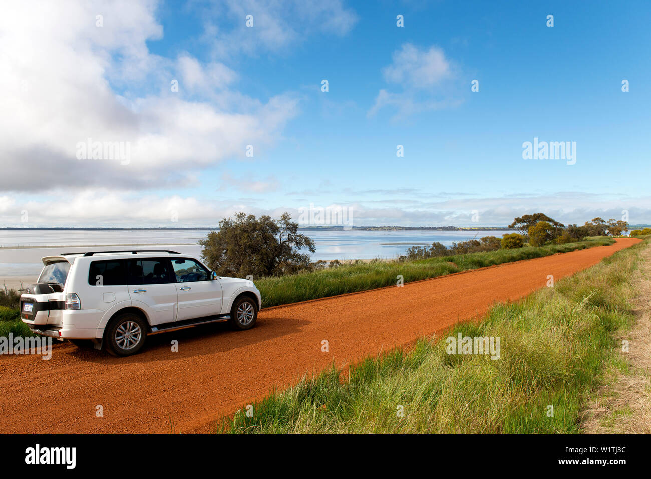 Unsealed road along Lake Dumbleyang in Western Australia Stock Photo ...