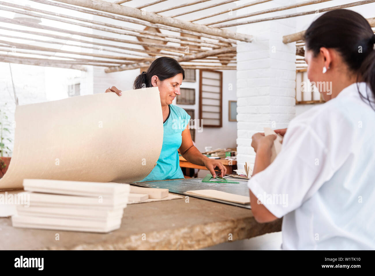 workers producing diverse things with their fine art paper, historical ...