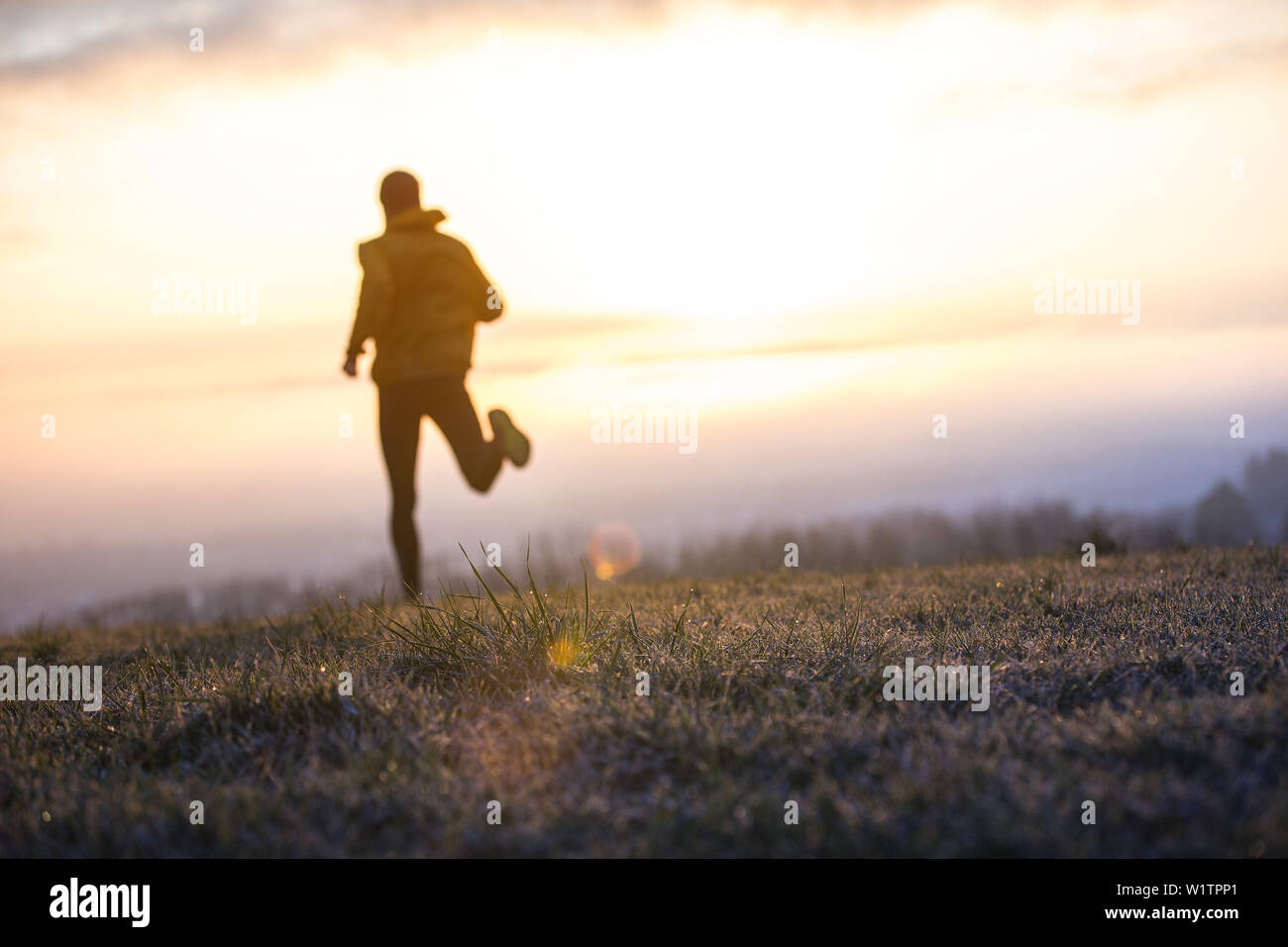 Young man running over hi-res stock photography and images - Alamy